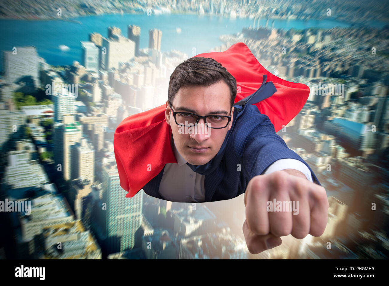 Flying super hero over the city Stock Photo - Alamy