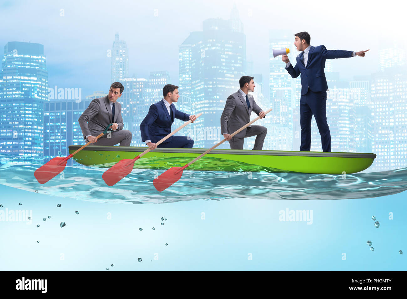 Team of businessmen in teamwork concept with boat Stock Photo - Alamy