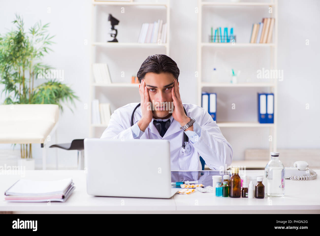 Doctor drug addict in the hospital Stock Photo - Alamy