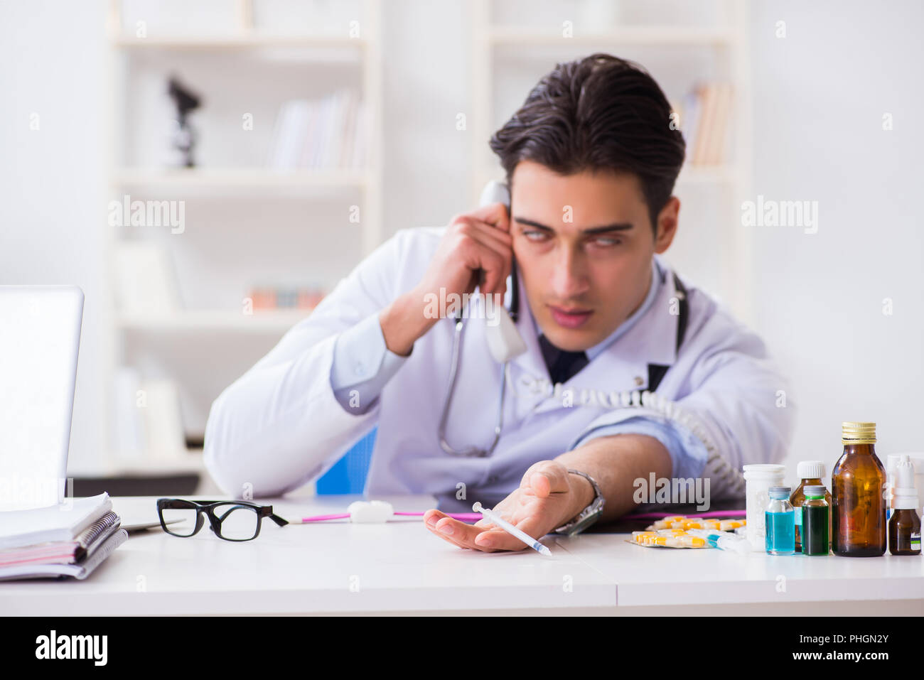 Doctor drug addict in the hospital Stock Photo - Alamy