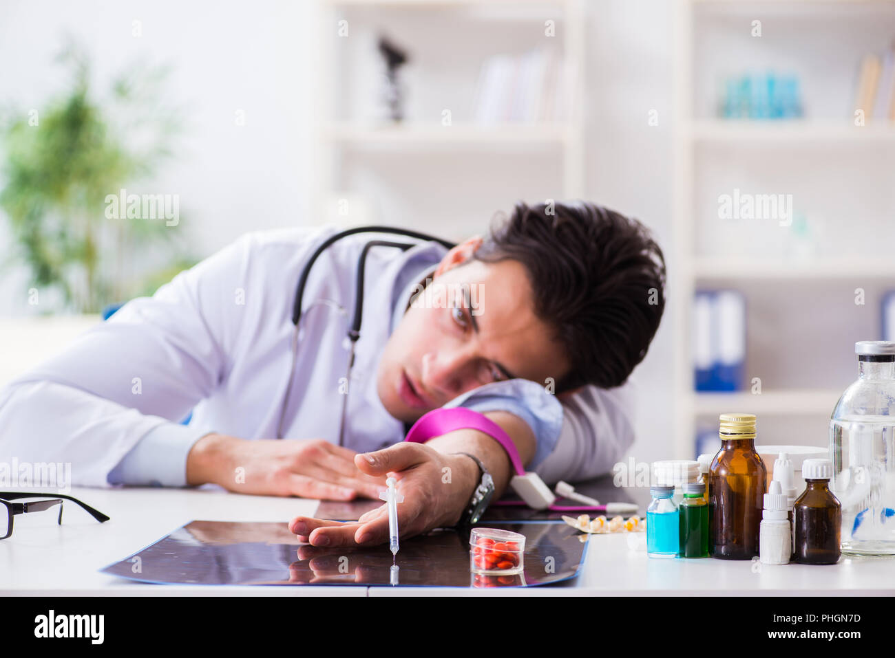 Doctor drug addict in the hospital Stock Photo - Alamy