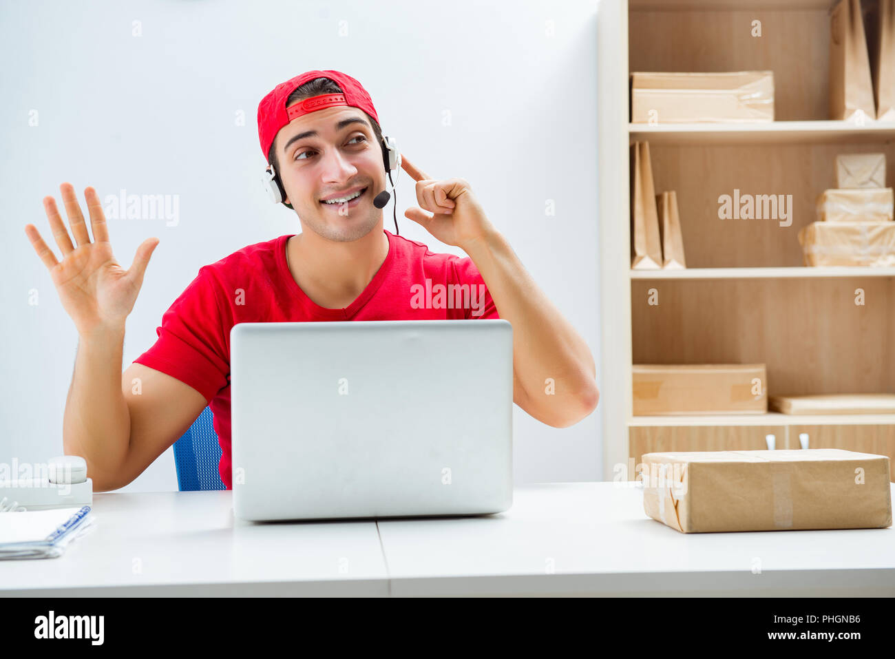 Call center worker at parcel distribution center in post office Stock ...