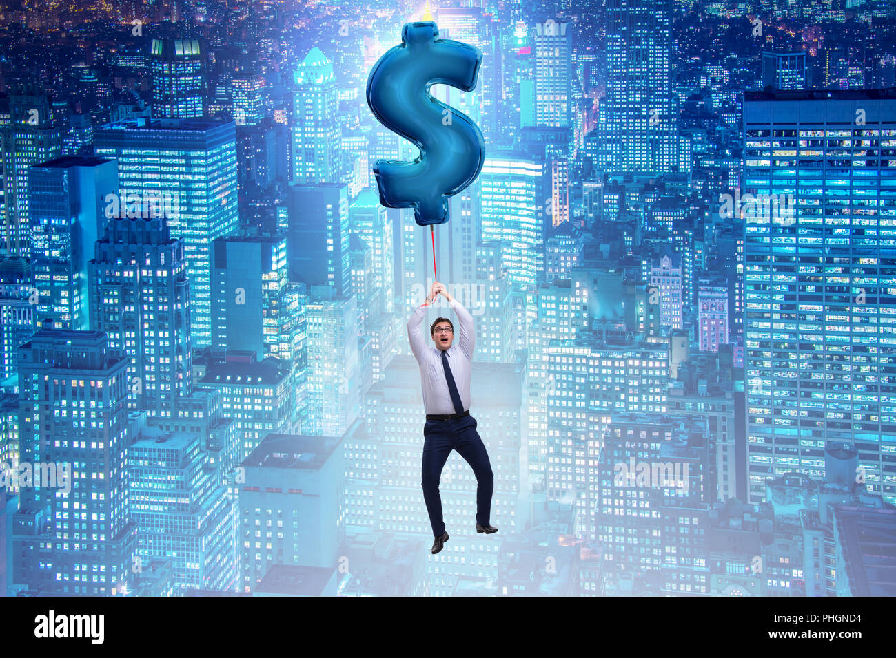 Businessman flying on dollar sign inflatable balloon Stock Photo - Alamy