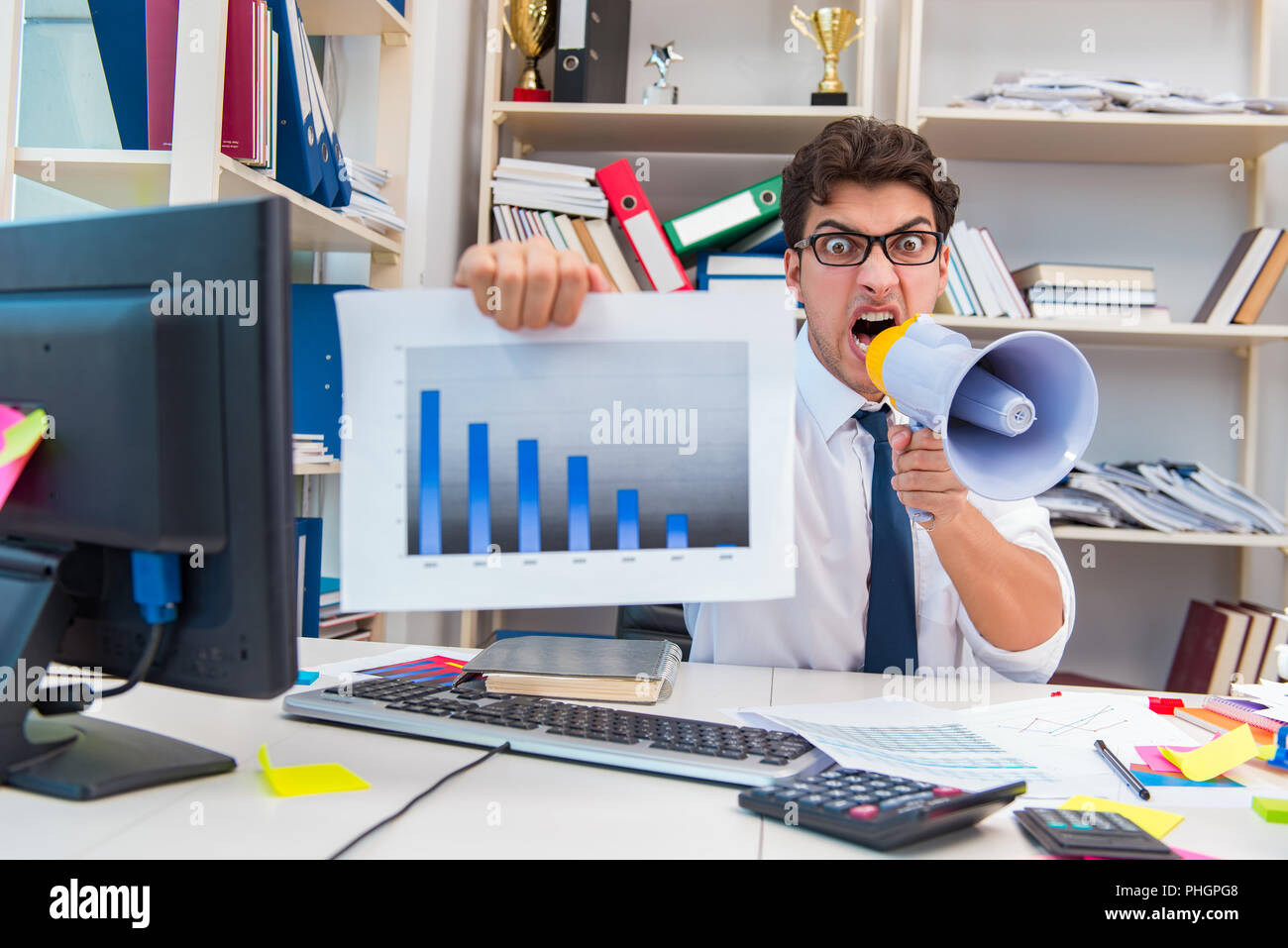 Busy frustrated businessman angry in the office Stock Photo - Alamy