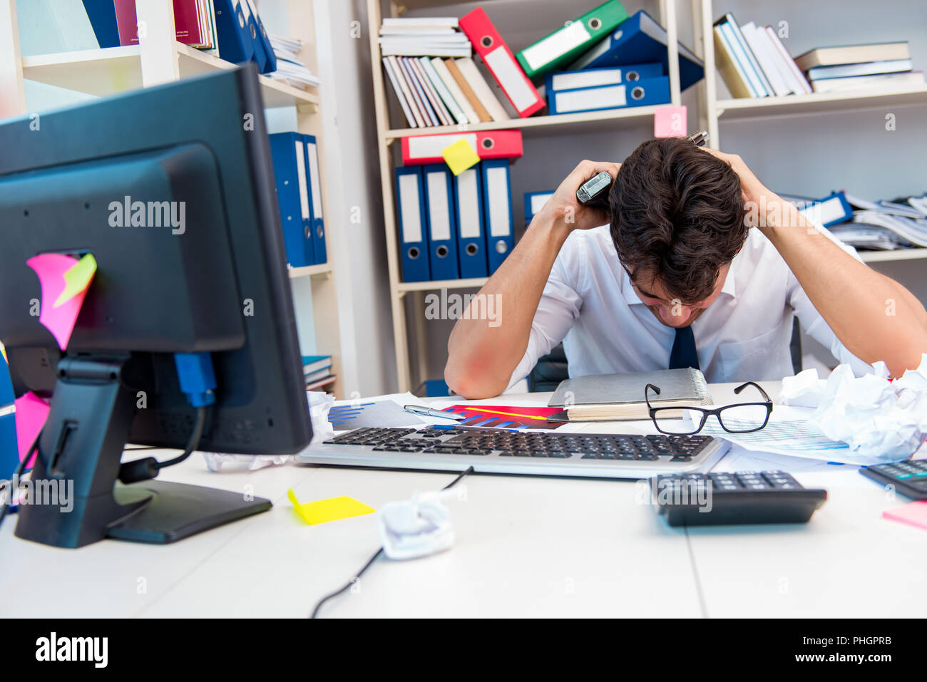 Busy frustrated businessman angry in the office Stock Photo - Alamy