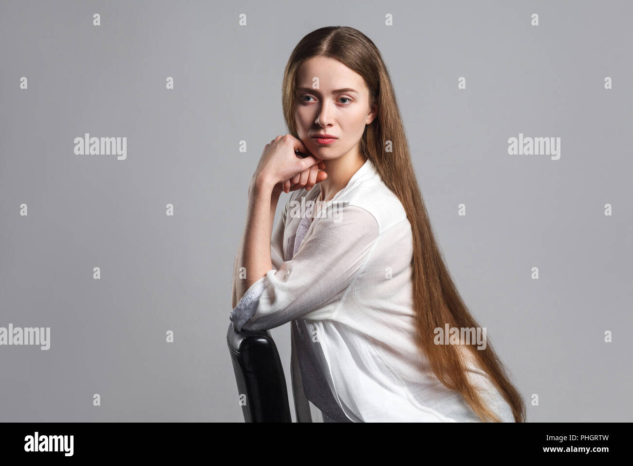 Portrait of confused sadness thoughtful young model actor with long ...