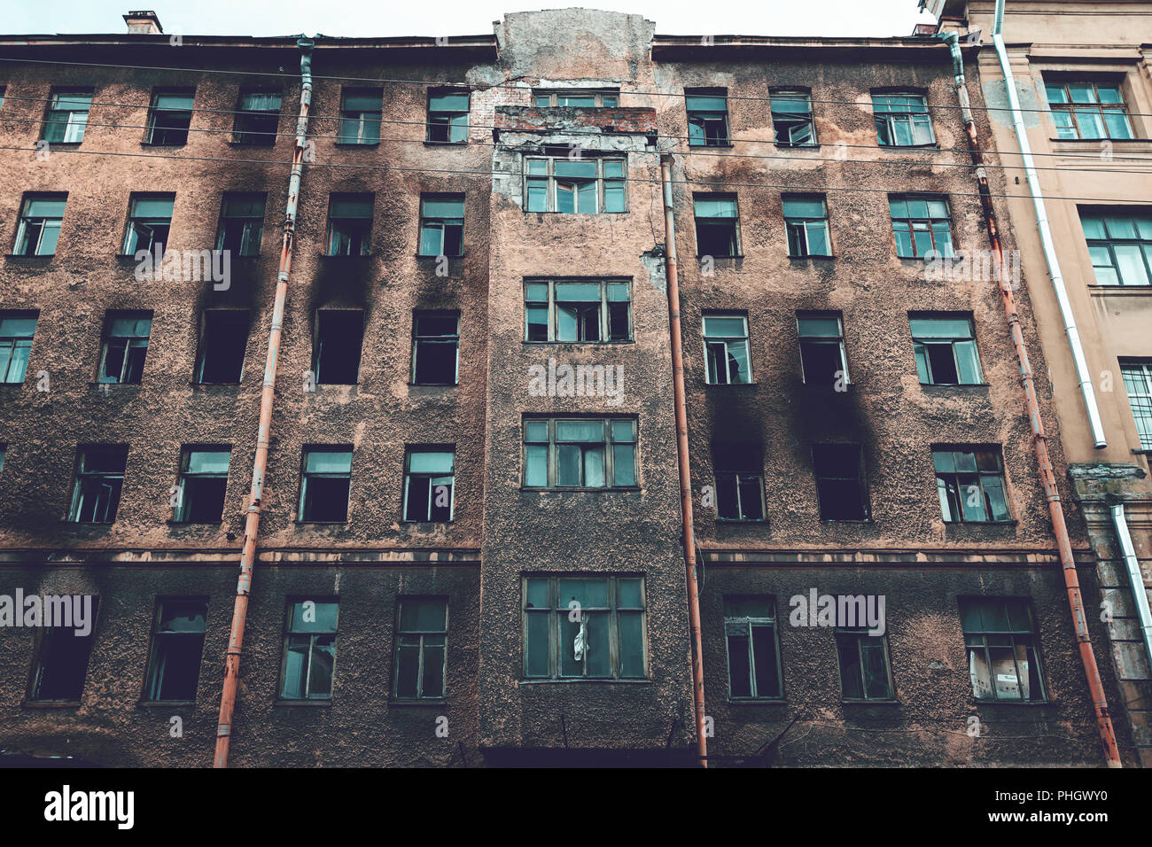 Broken dark burned building without windows concept Stock Photo - Alamy