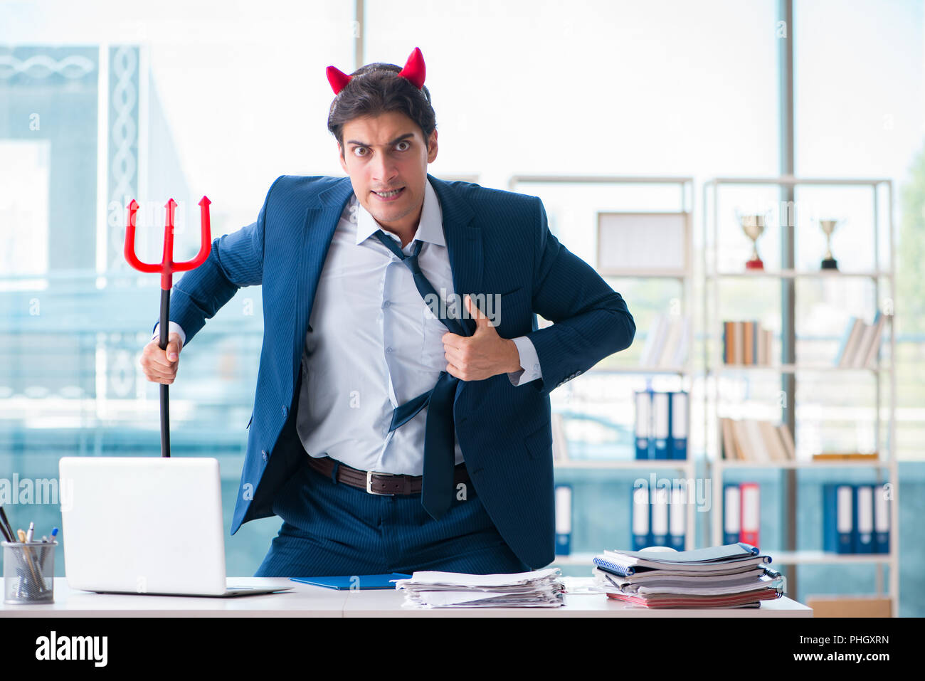 Devil angry businessman in the office Stock Photo - Alamy