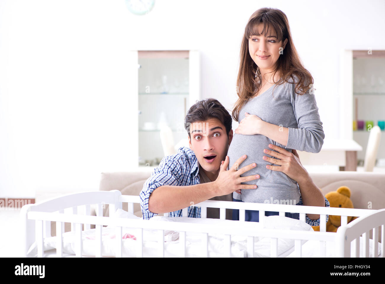 Young parents expecting their first baby Stock Photo - Alamy