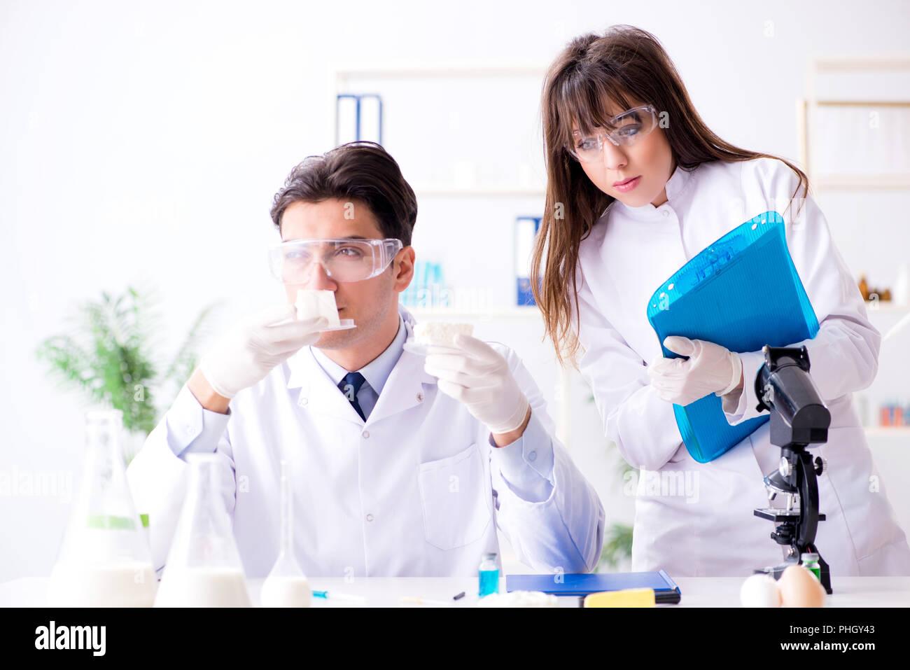 Doctor writing organic products hi-res stock photography and images - Alamy
