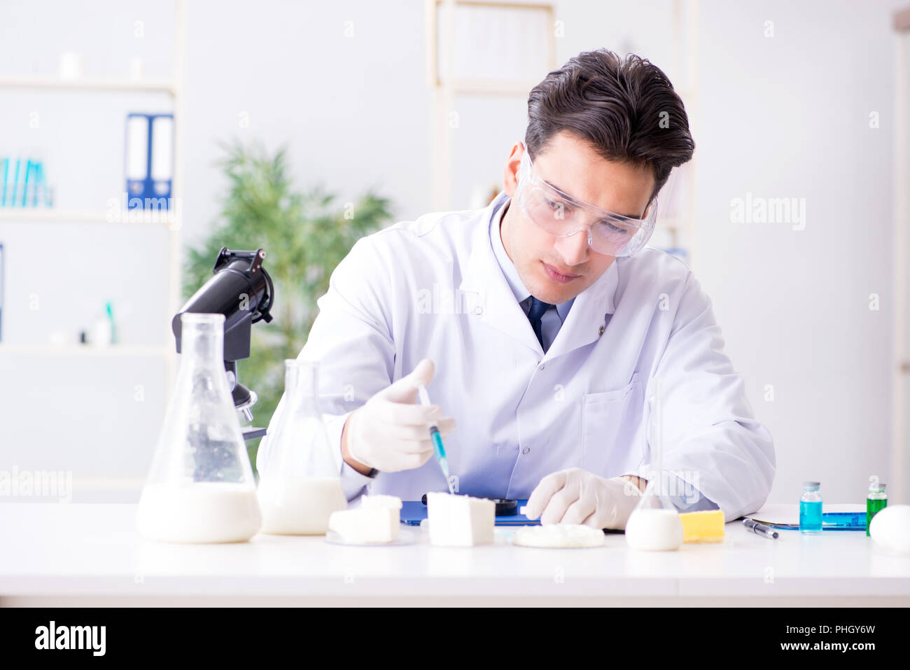 Food scientist testing new stuff in the lab Stock Photo - Alamy