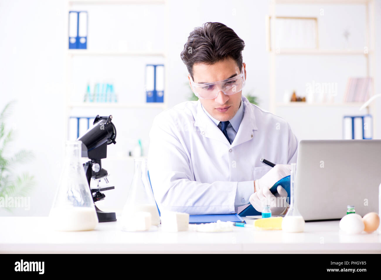 Food scientist testing new stuff in the lab Stock Photo - Alamy
