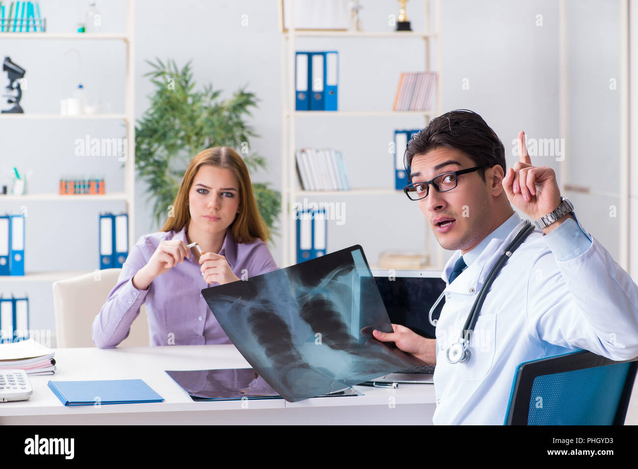 Doctor examining x-ray images of patient Stock Photo - Alamy