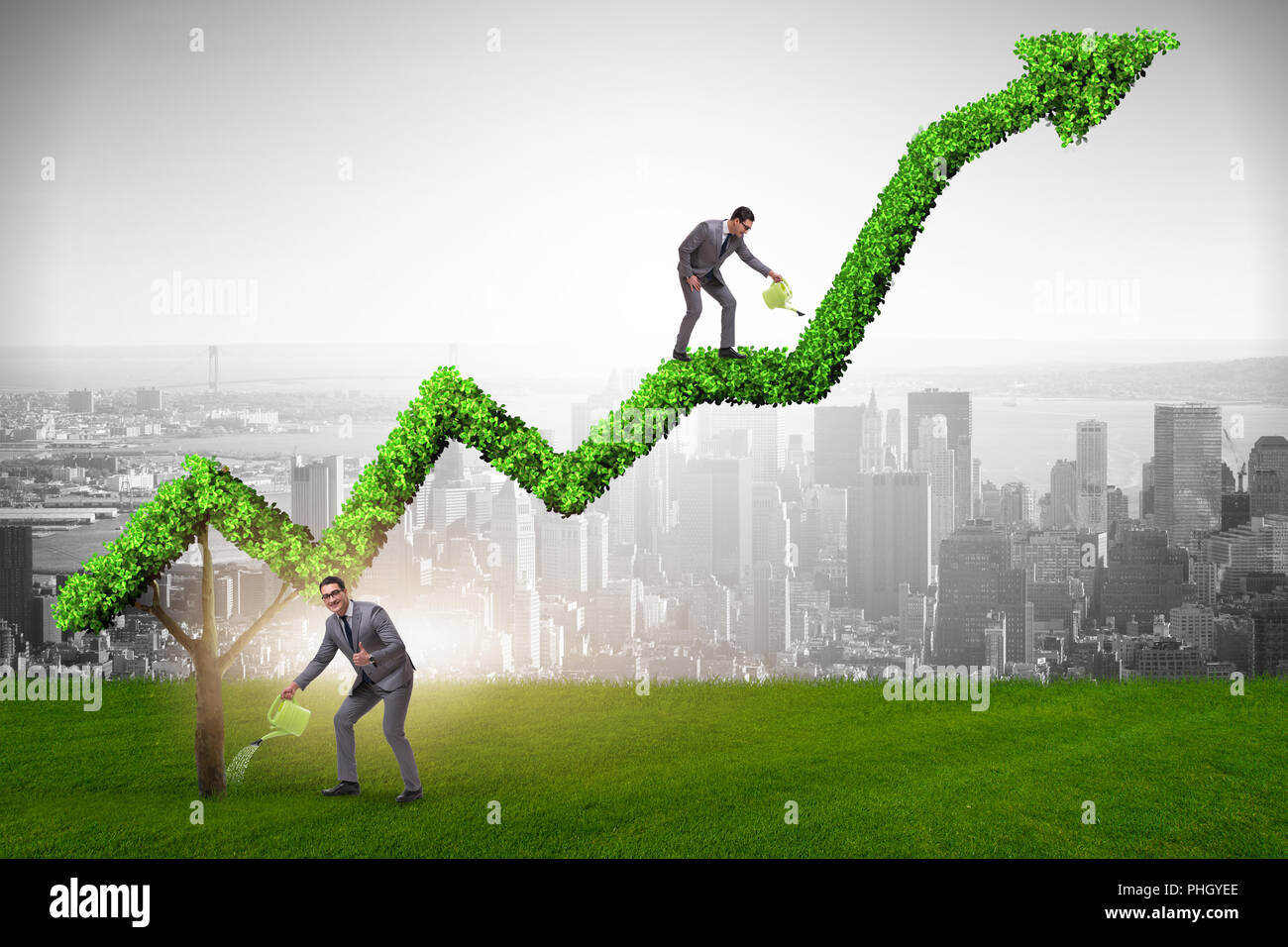 Businessman in investment concept watering financial line chart Stock ...