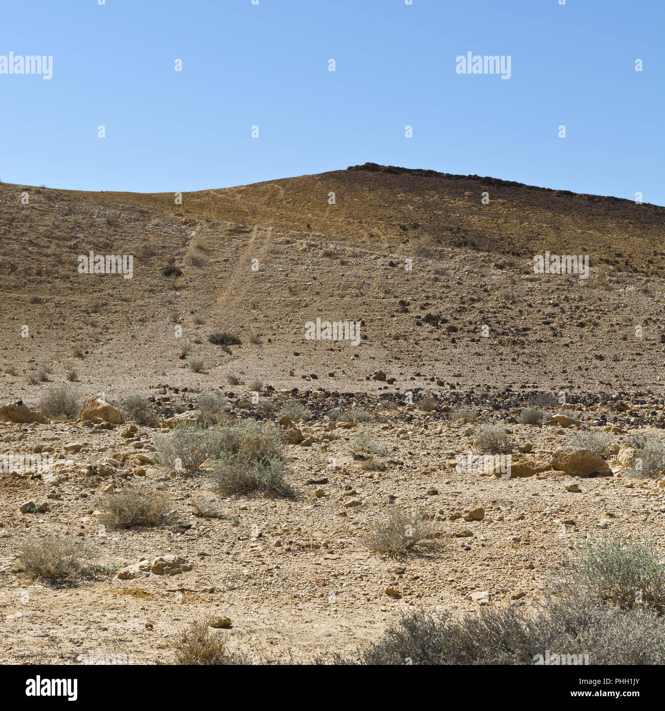 Dusty mountains and deep craters Stock Photo - Alamy