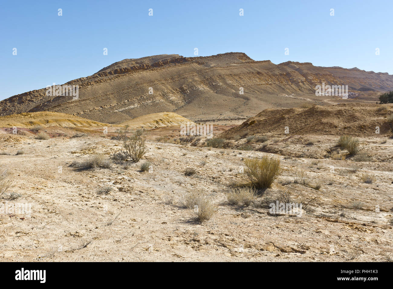 Dusty mountains and deep craters Stock Photo - Alamy