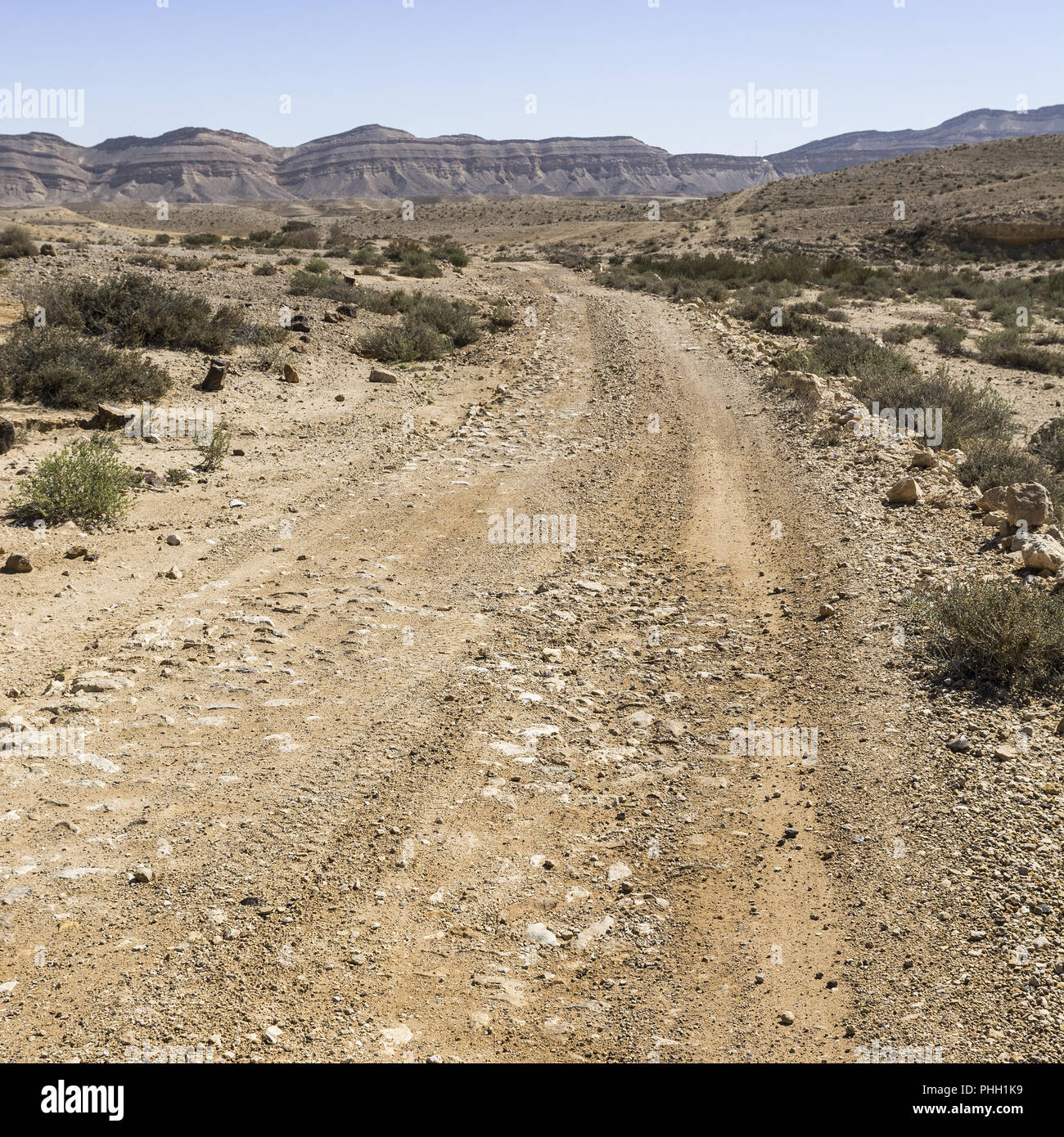 Dusty mountains and deep craters Stock Photo - Alamy