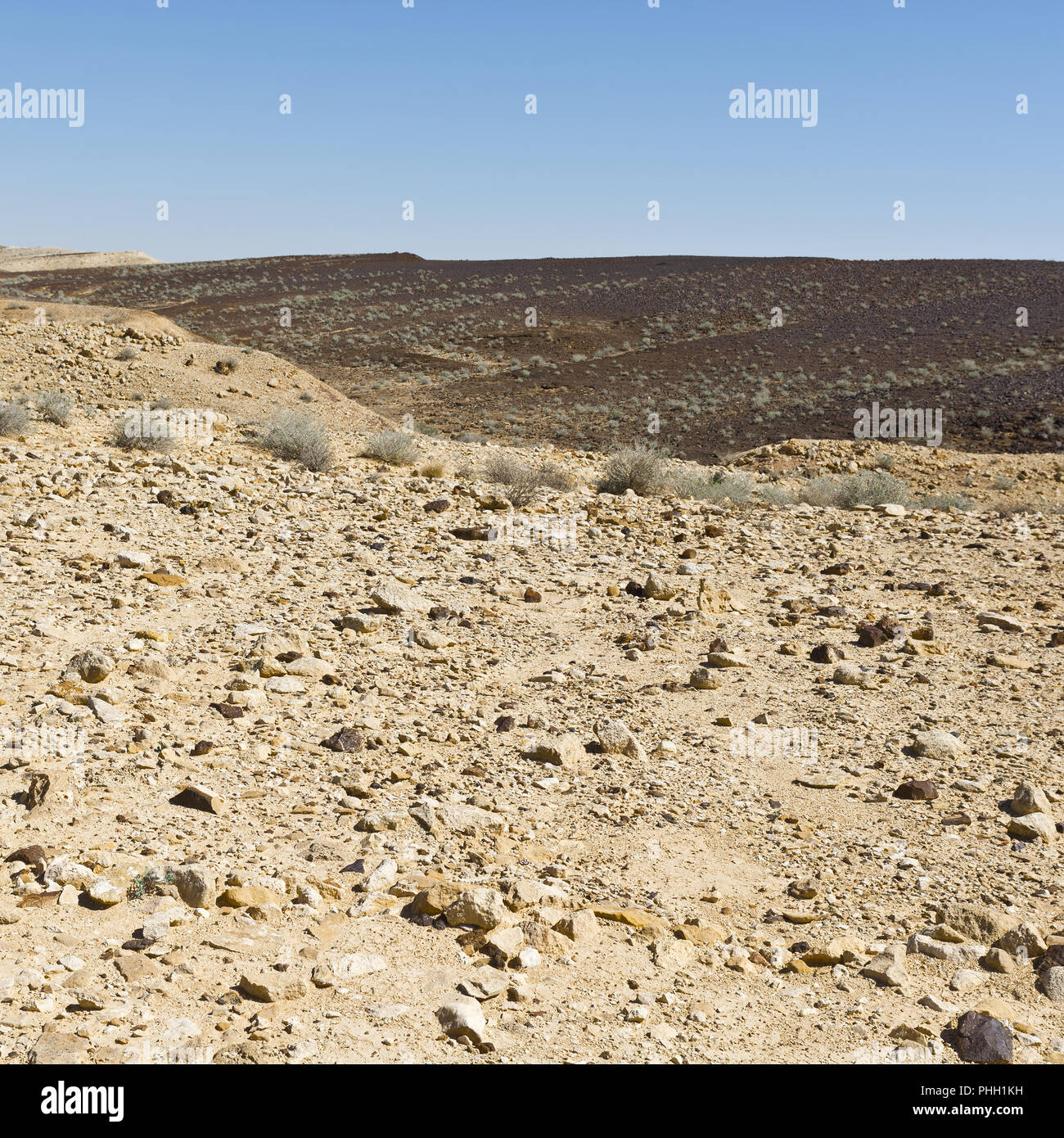 Dusty mountains and deep craters Stock Photo - Alamy