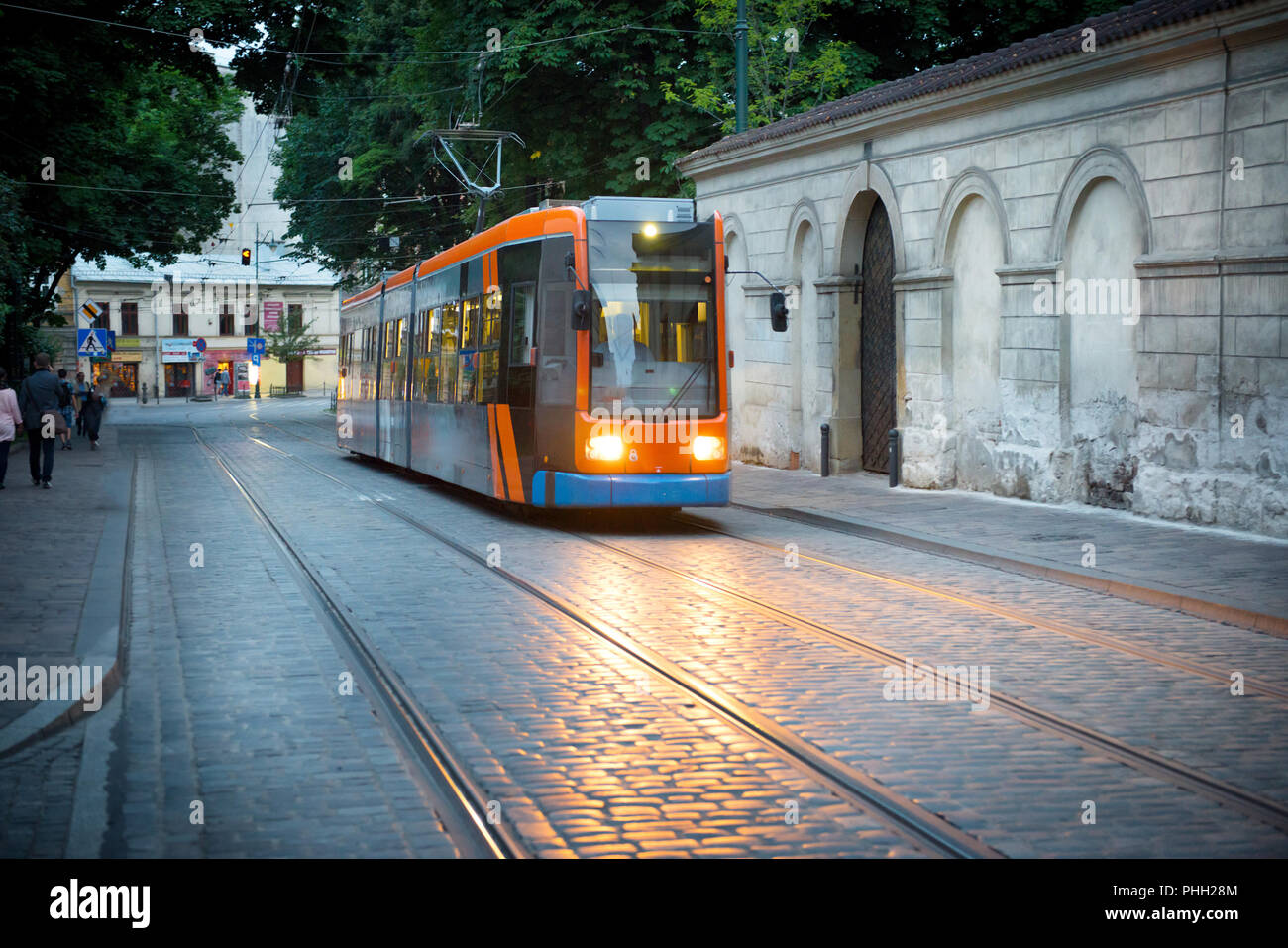Tram on european city street Stock Photo - Alamy