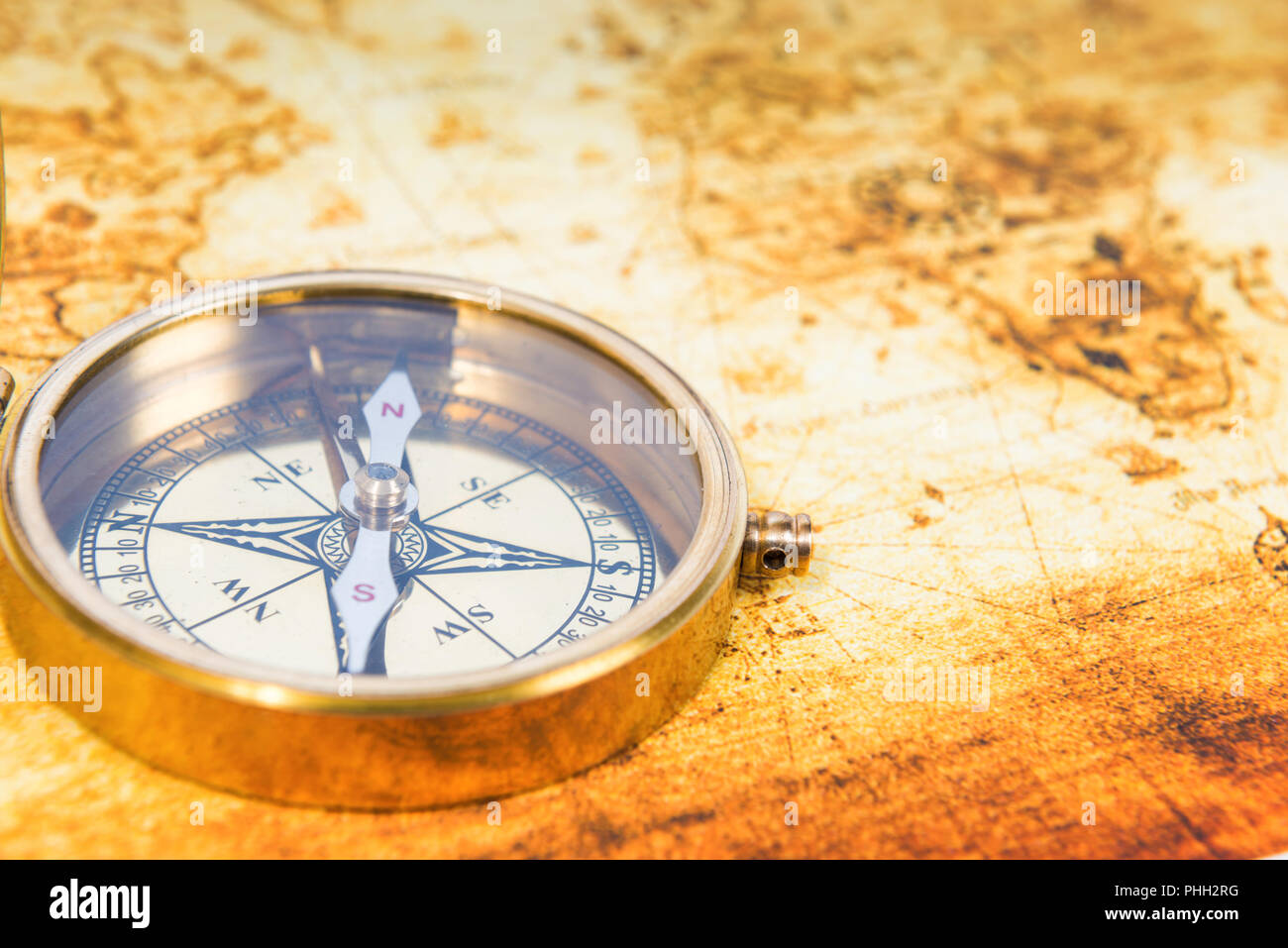 Old map with an ancient compass Stock Photo - Alamy