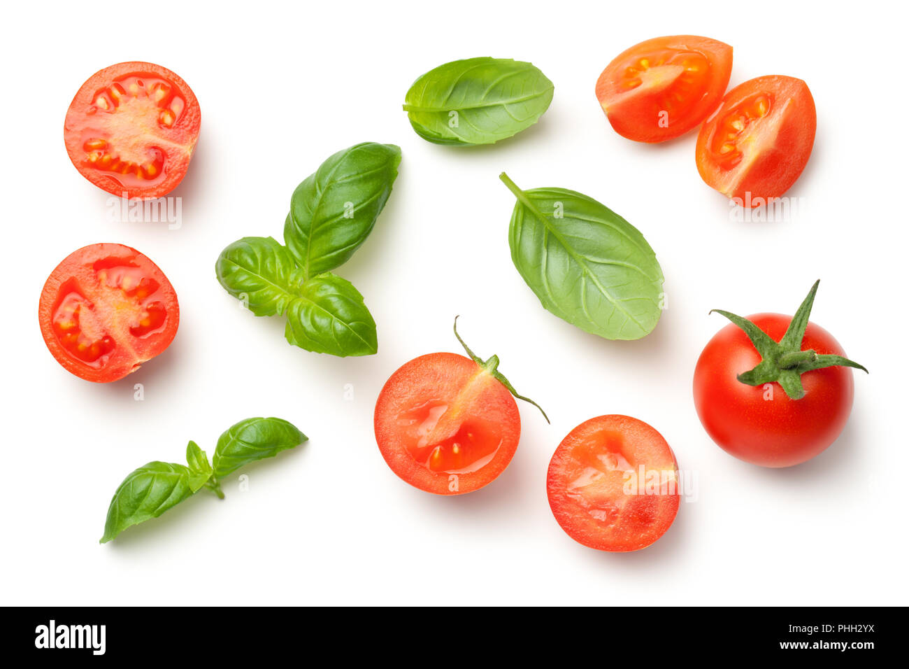 Tomatoes and fresh basil leaves Cut Out Stock Images & Pictures - Alamy