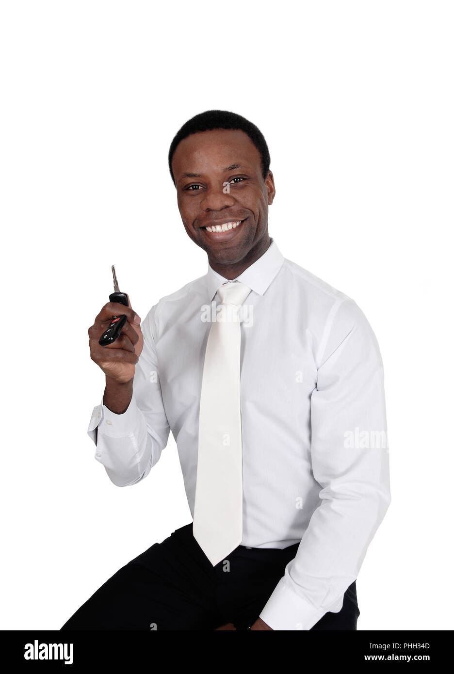 Happy African man with his car key's Stock Photo - Alamy