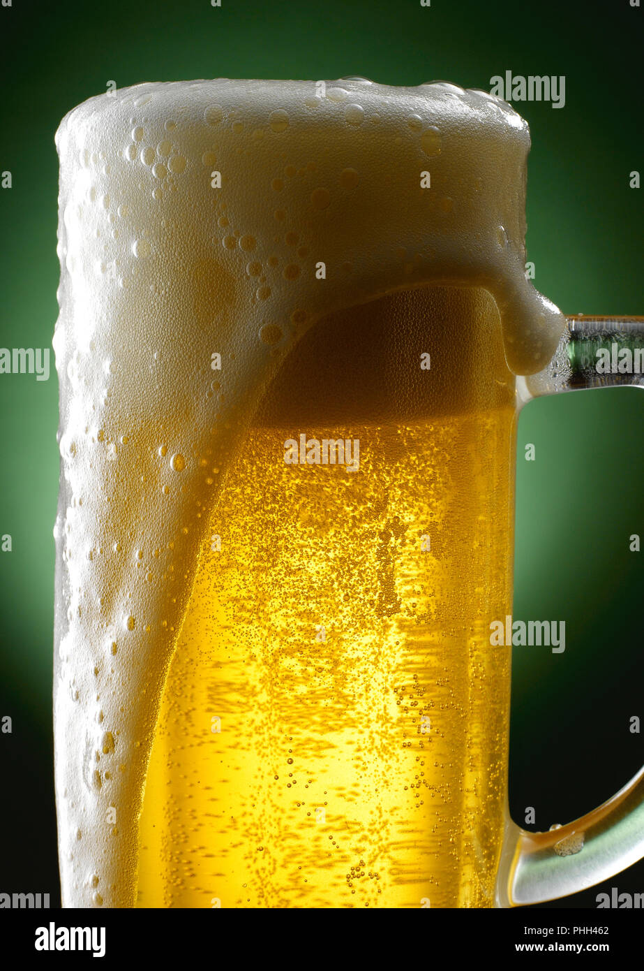 mug of frothy beer Stock Photo - Alamy