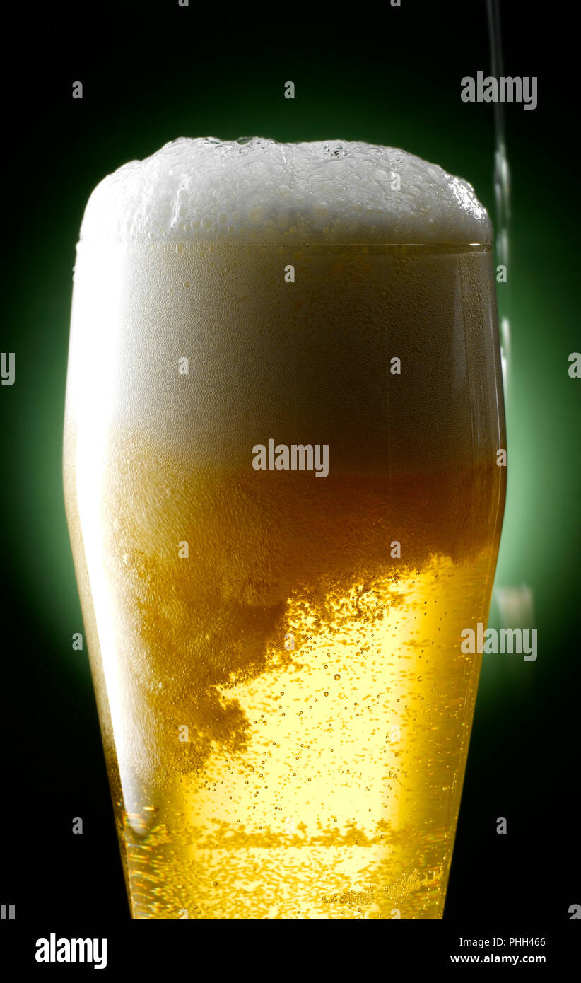 mug of frothy beer Stock Photo - Alamy