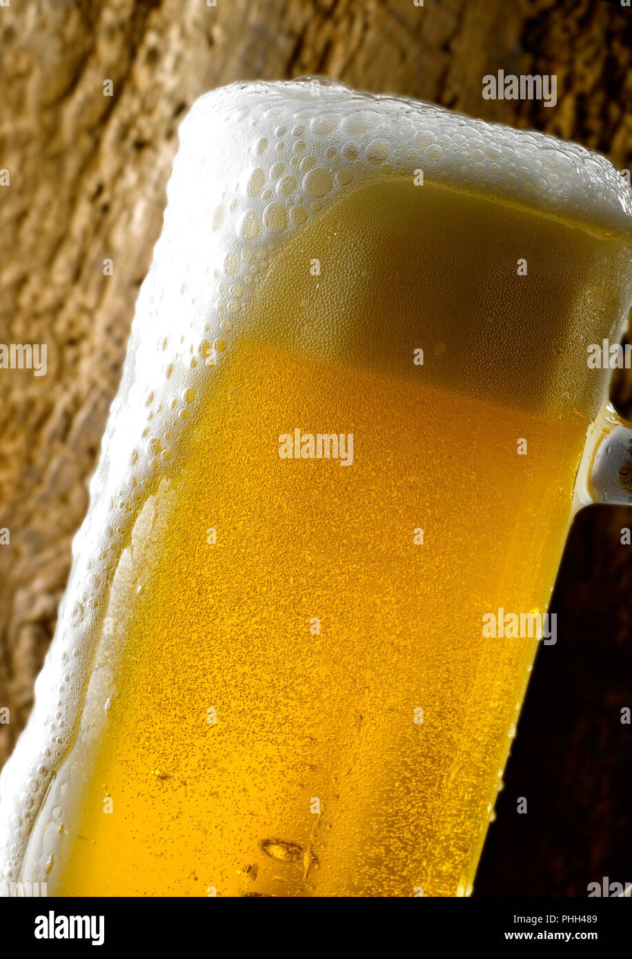 mug of frothy beer Stock Photo - Alamy