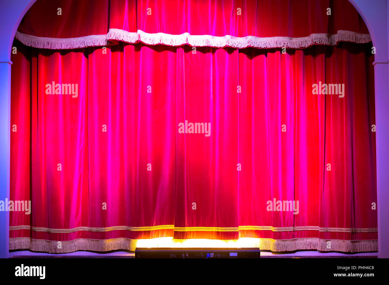Theatre curtain on stage Stock Photo - Alamy