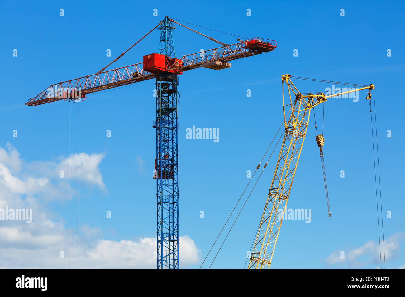 Two construction cranes Stock Photo - Alamy
