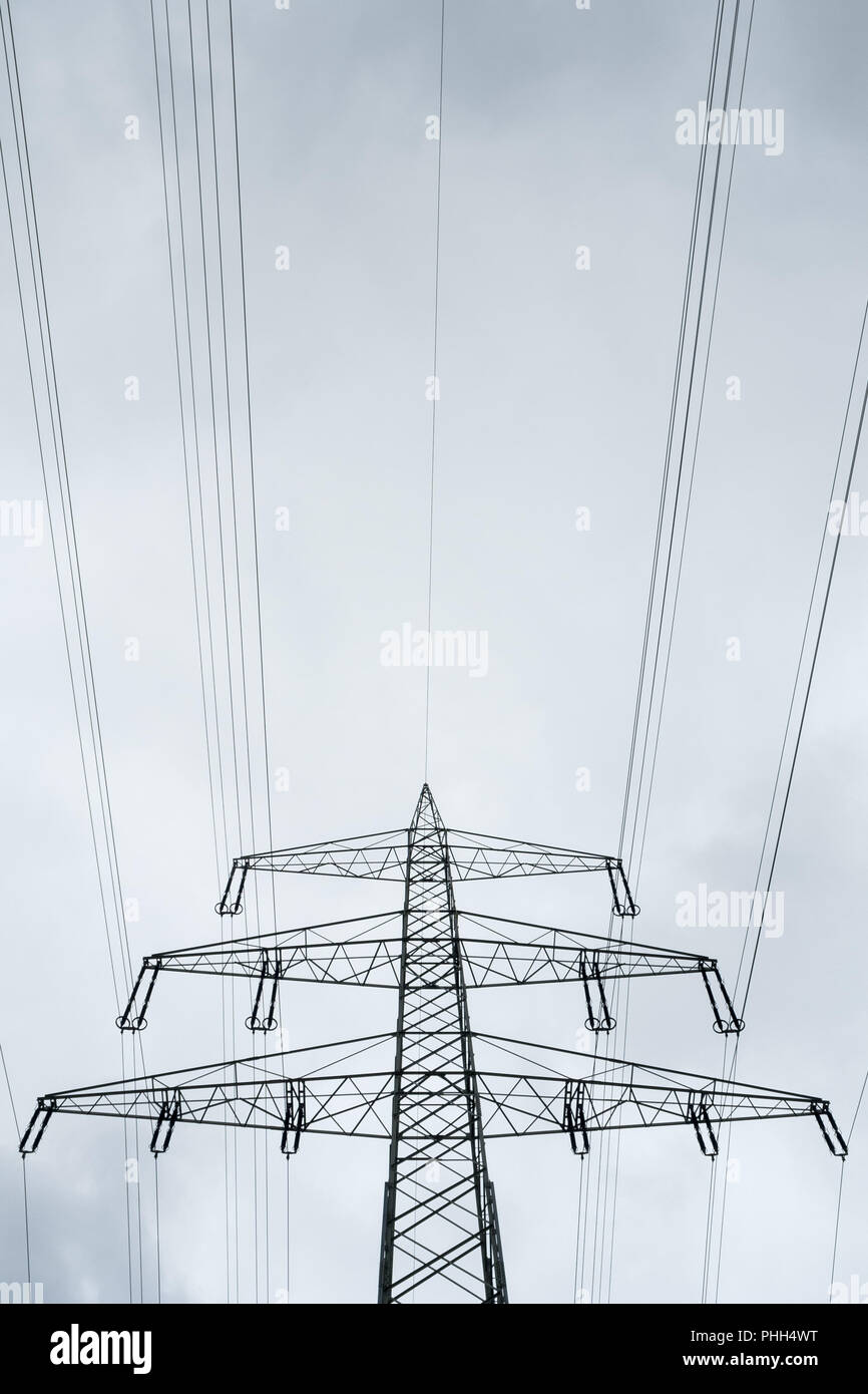 Pylon in front of the sky Stock Photo - Alamy