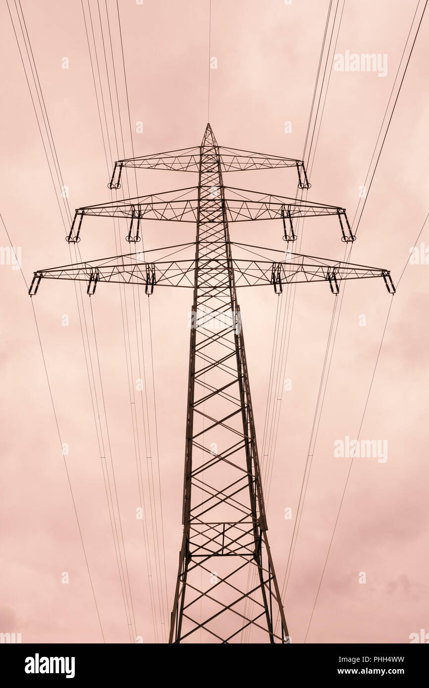 Pylon in front of the sky Stock Photo - Alamy