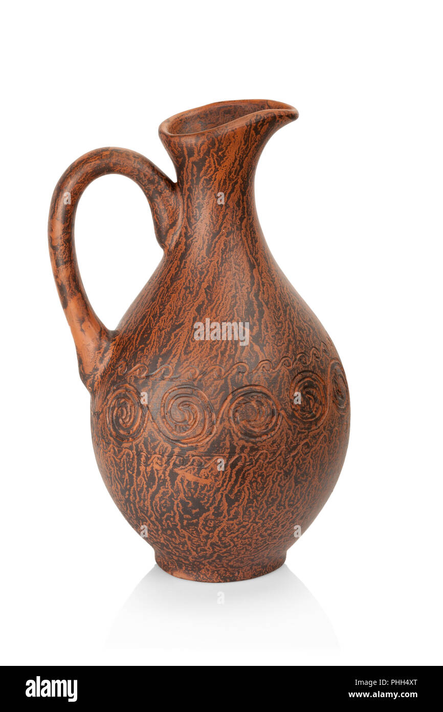 Clay jug isolated on white background made with kefir burn technique ...