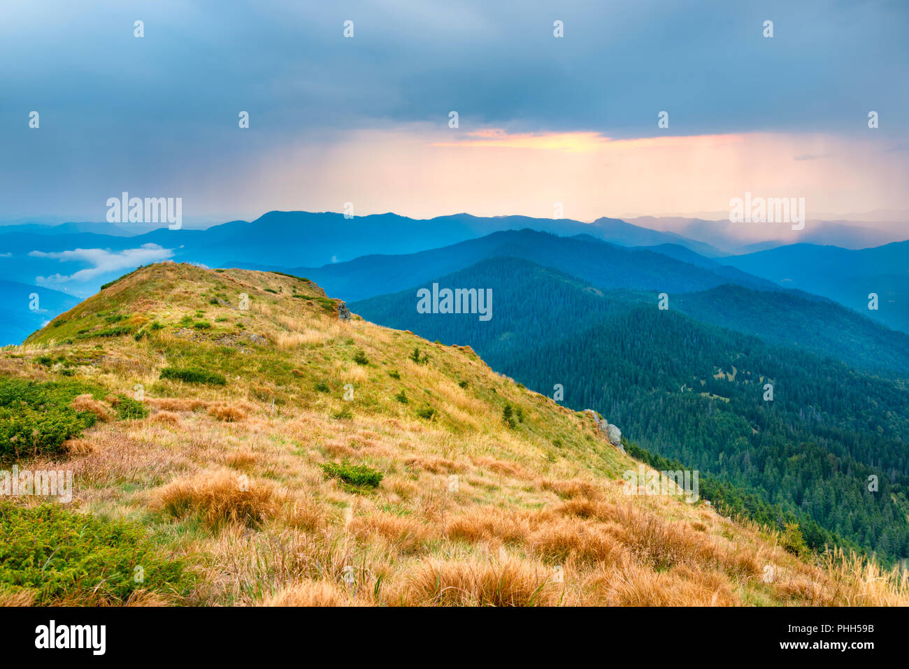 Sunlight over hills hi-res stock photography and images - Alamy