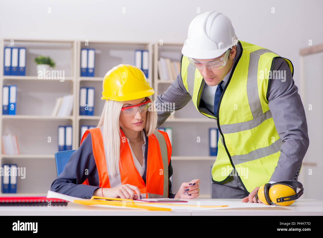Construction workers having discussion in office before starting Stock ...