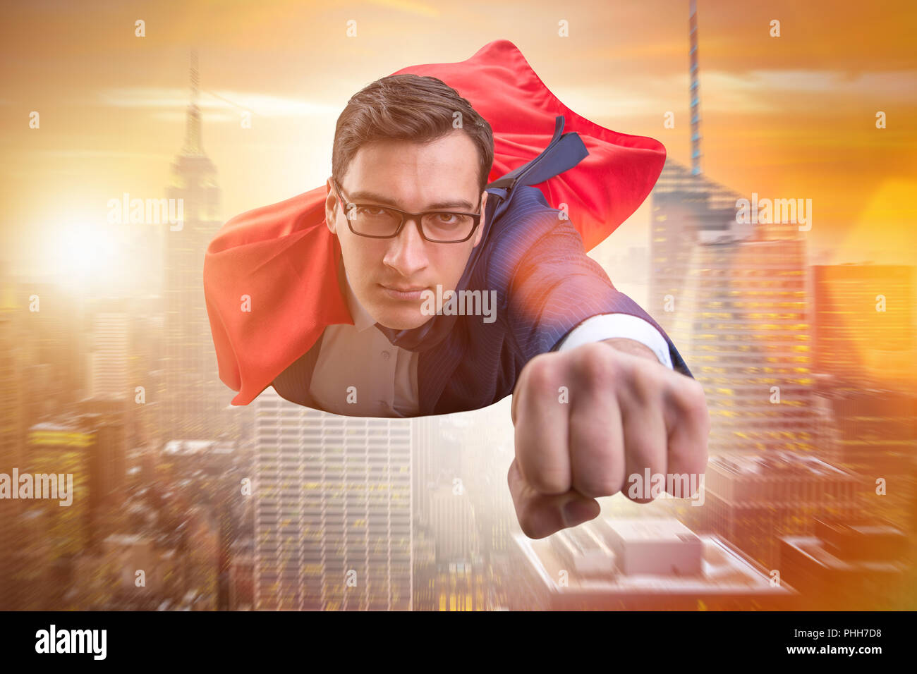 Flying super hero over the city Stock Photo - Alamy