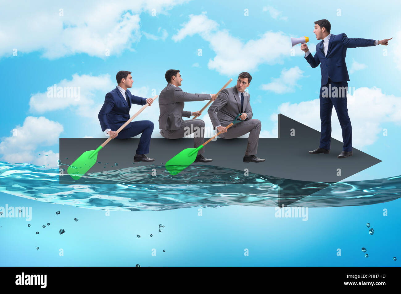 Teamwork concept with businessmen on boat Stock Photo - Alamy