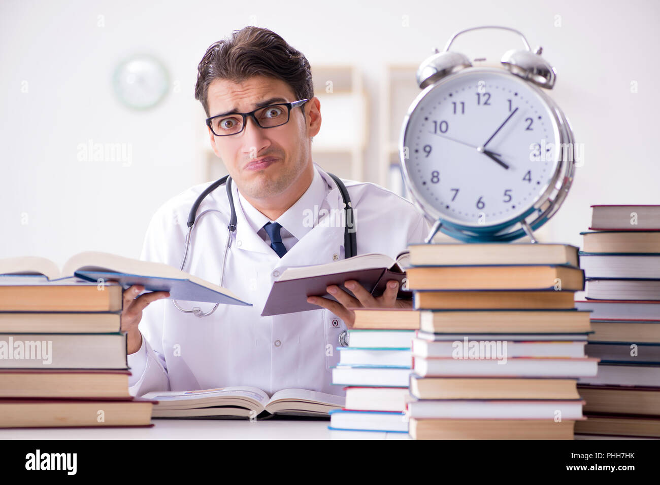 Medical student running out of time for exams Stock Photo - Alamy