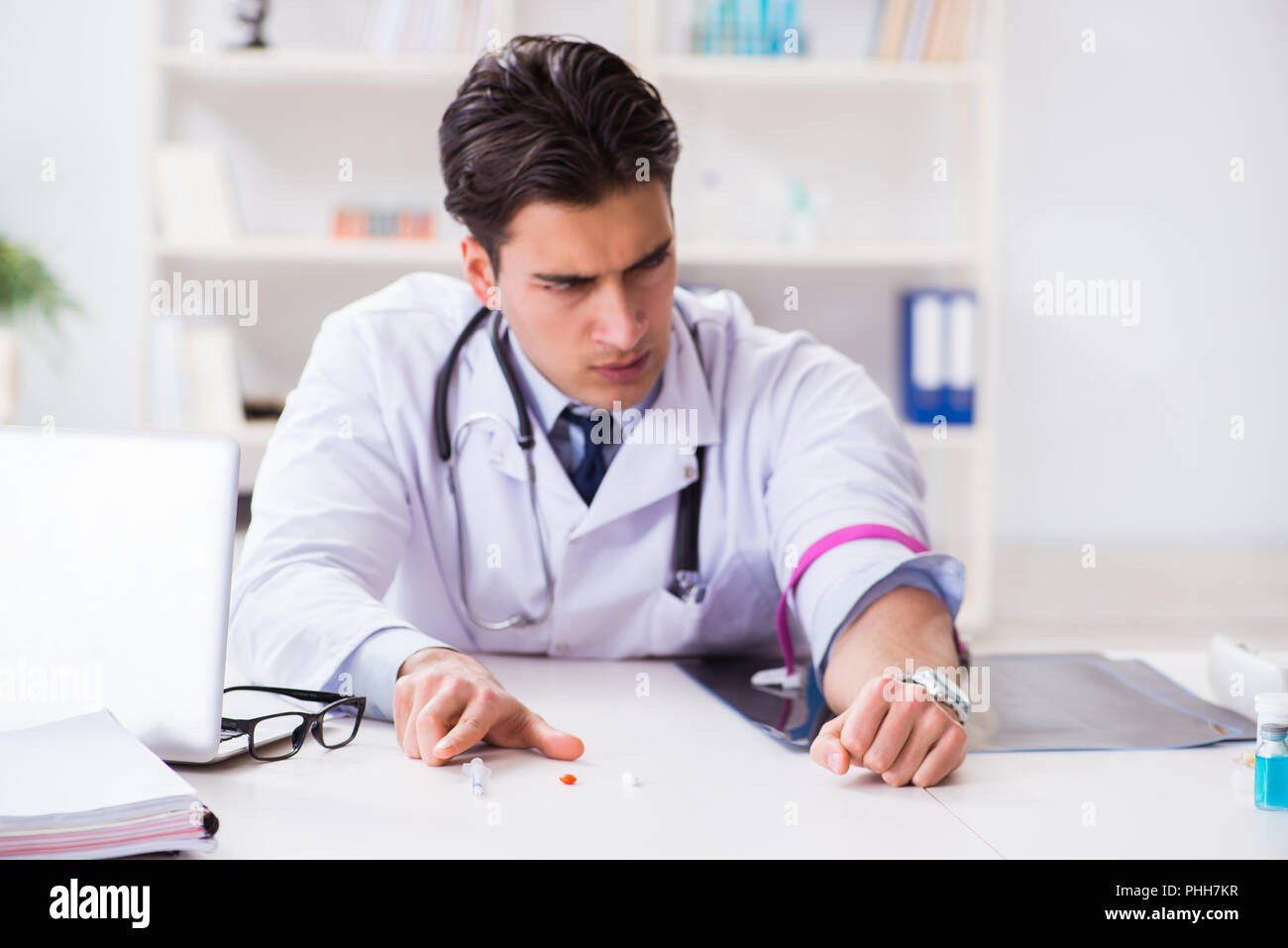 Doctor drug addict in the hospital Stock Photo - Alamy