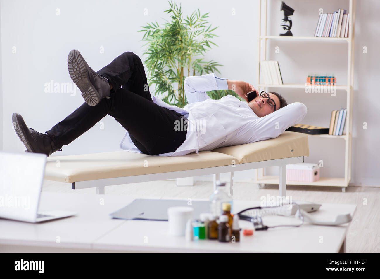 Doctor relaxing after complex surgery in hospital Stock Photo - Alamy