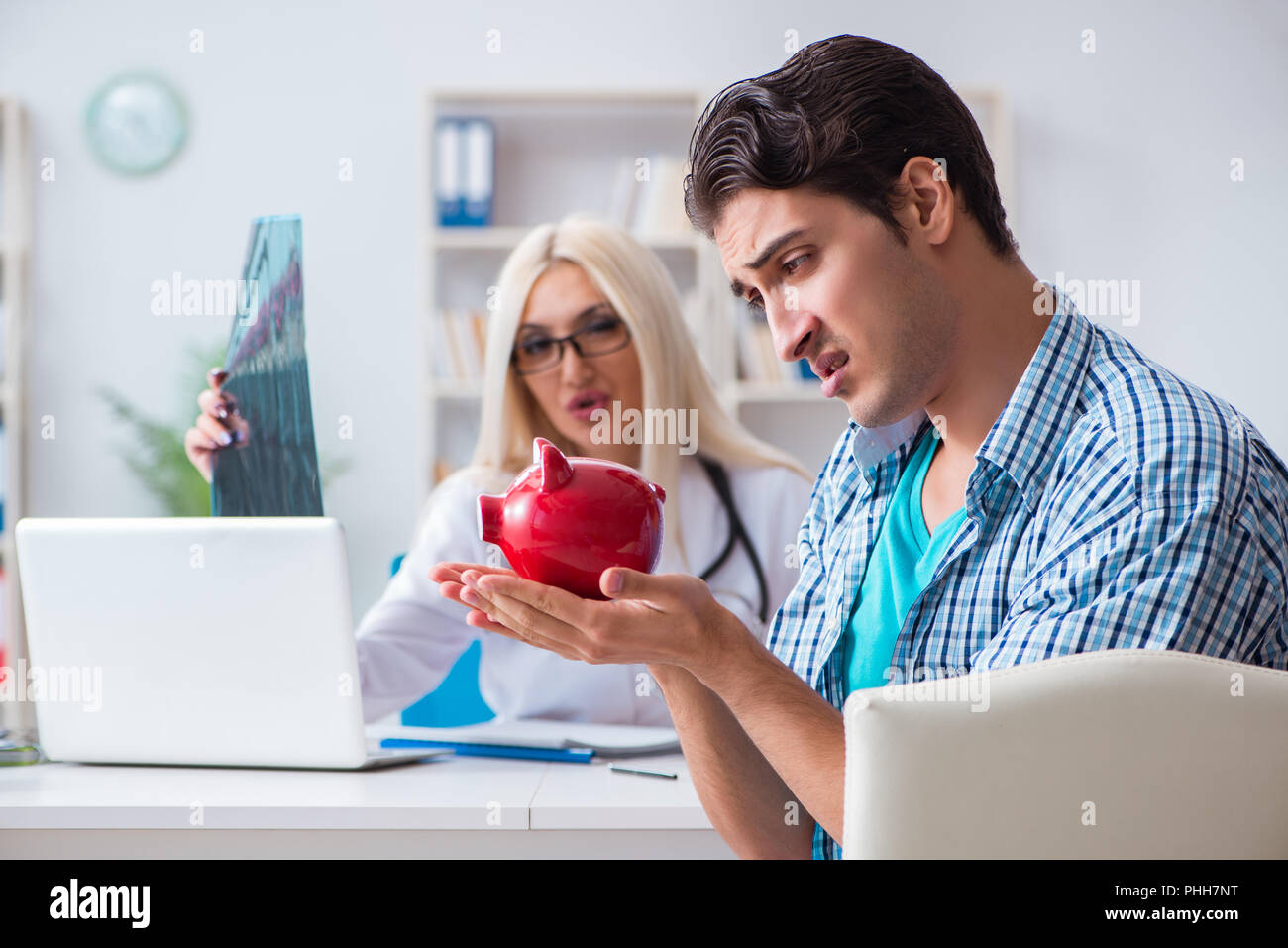 Male patient angry at expensive healthcare bill Stock Photo - Alamy