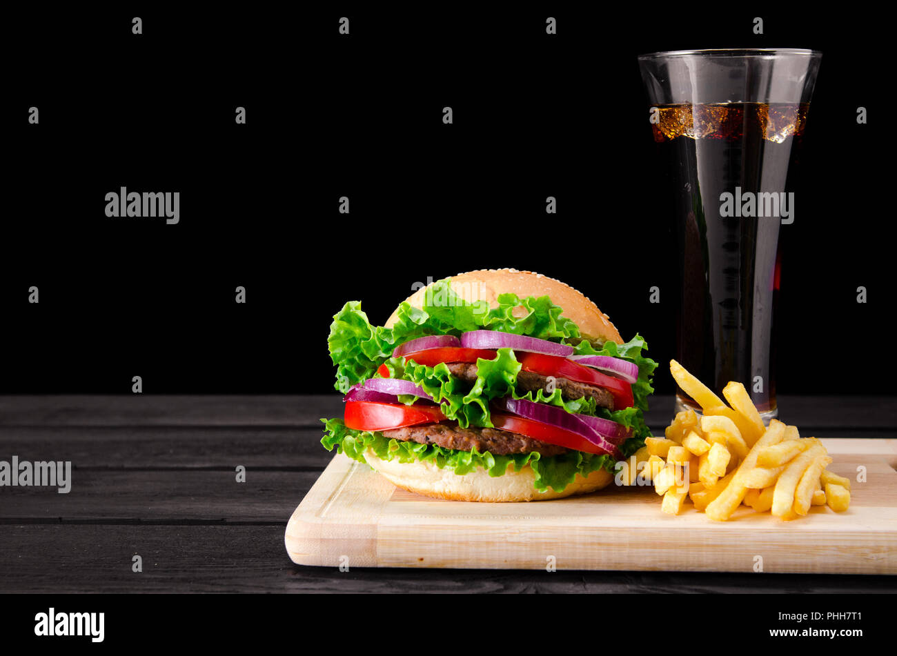 Burger served in bun in nutrition fast food concept Stock Photo - Alamy