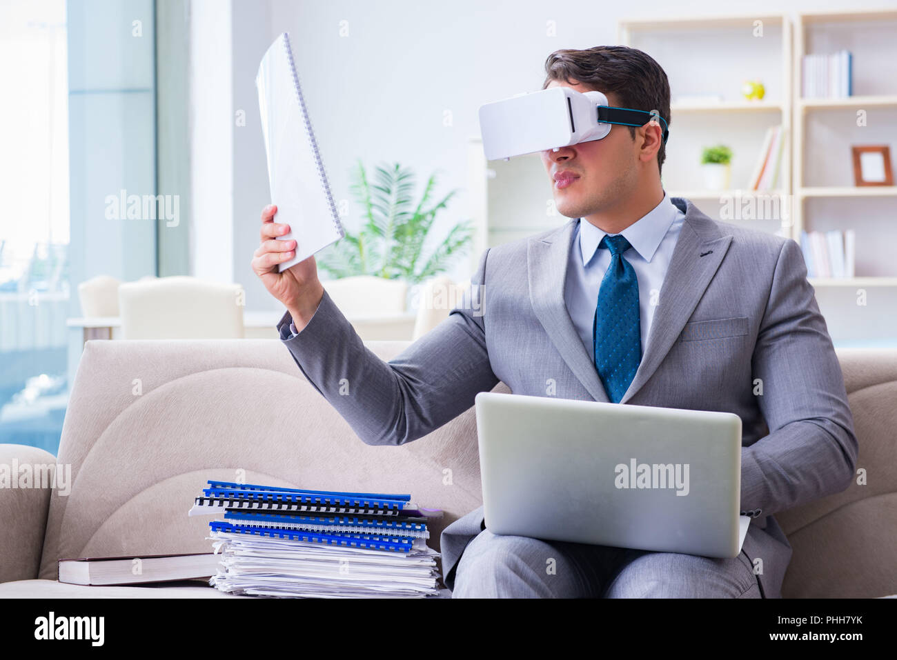 Businessman with virtual reality glasses in modern technology co Stock ...