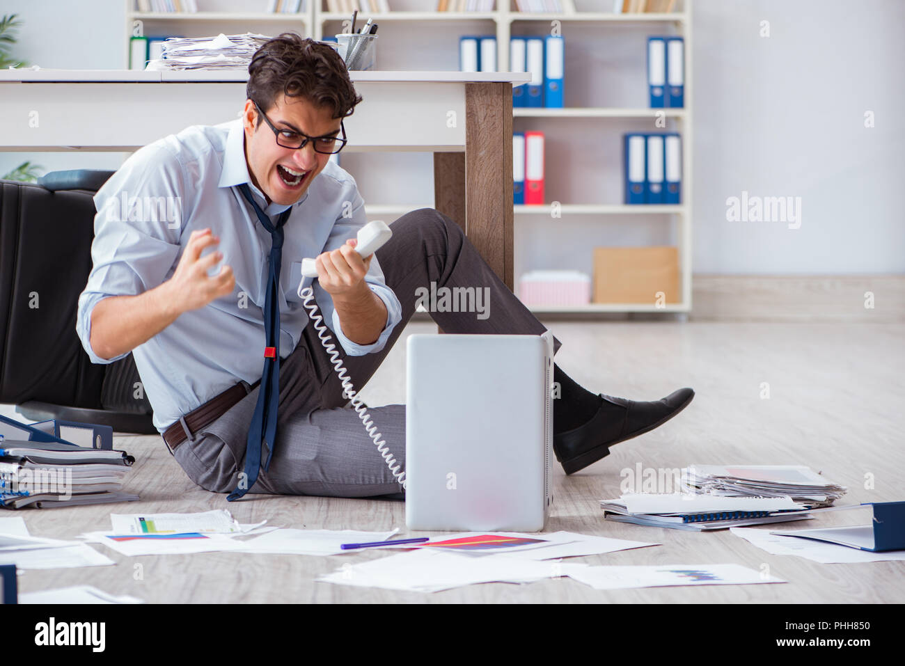 Bankrupt businessman angry in the office floor Stock Photo - Alamy