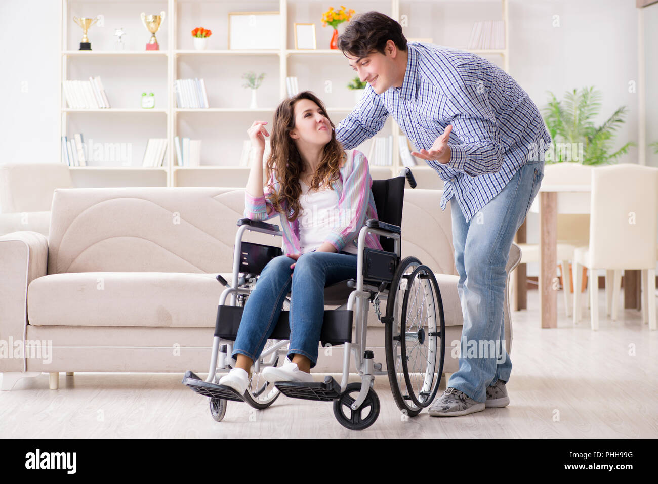 Young family taking care of each other Stock Photo - Alamy