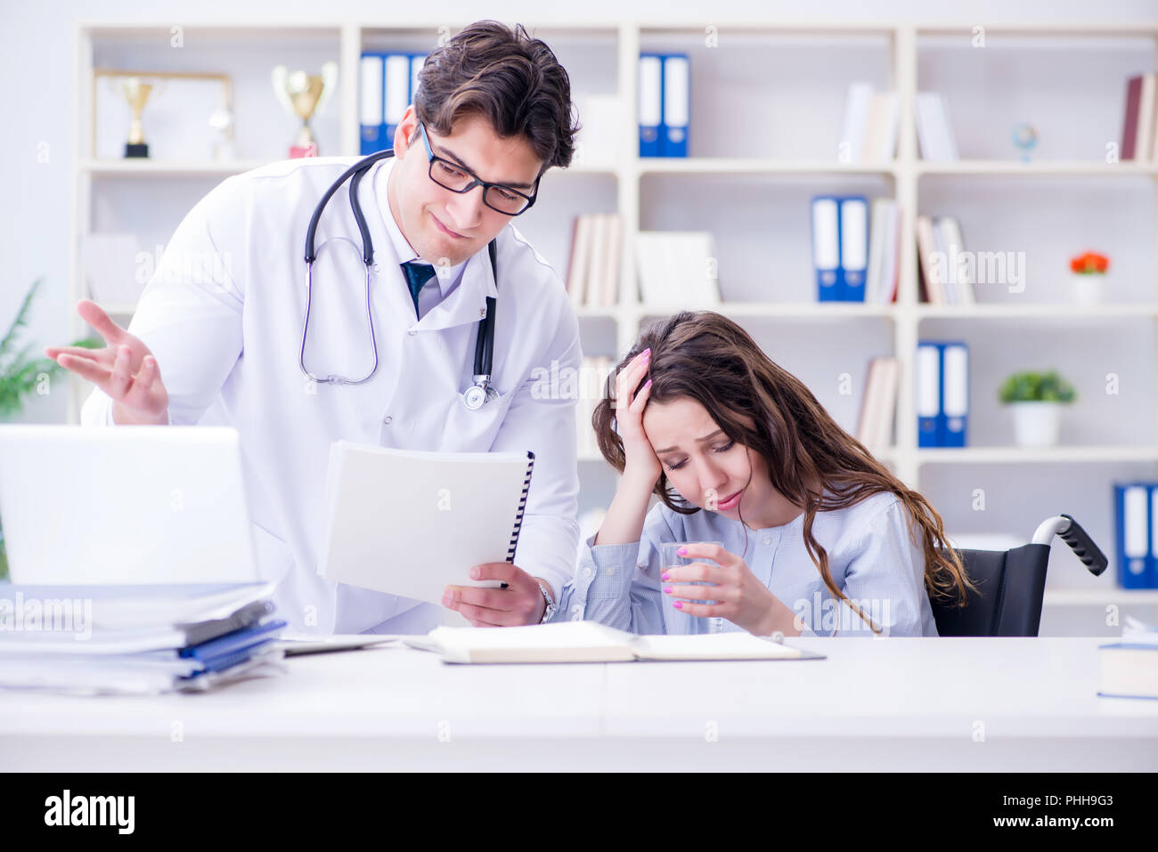 Woman doctor sharing test results hi-res stock photography and images ...