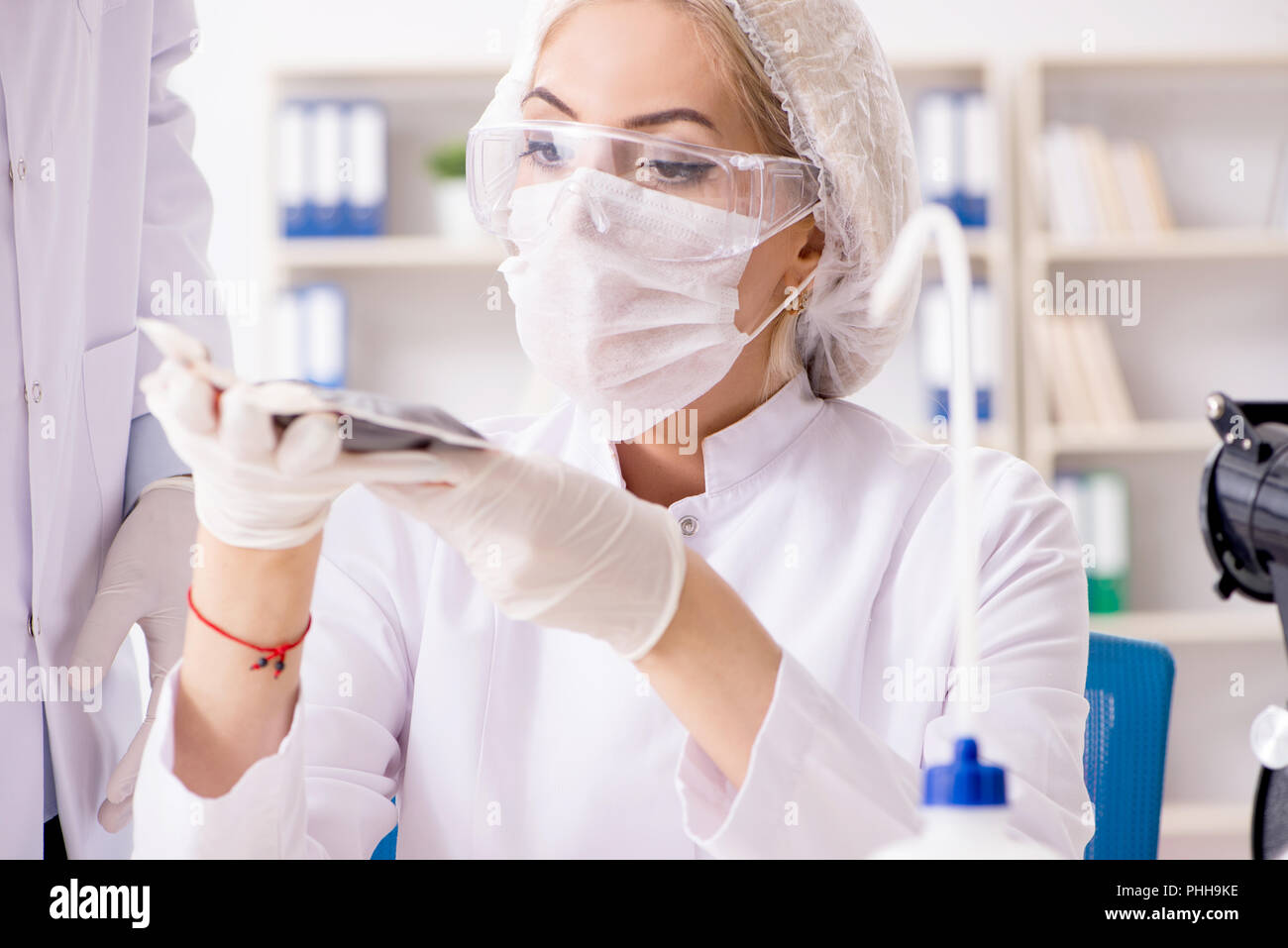Young female woman doctor in hospital clinic lab Stock Photo - Alamy