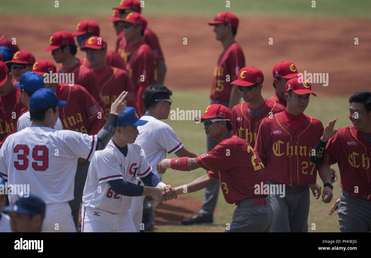 Jakarta. 1st Sep, 2018. Players of Chinese Taipei (White) shake hands ...