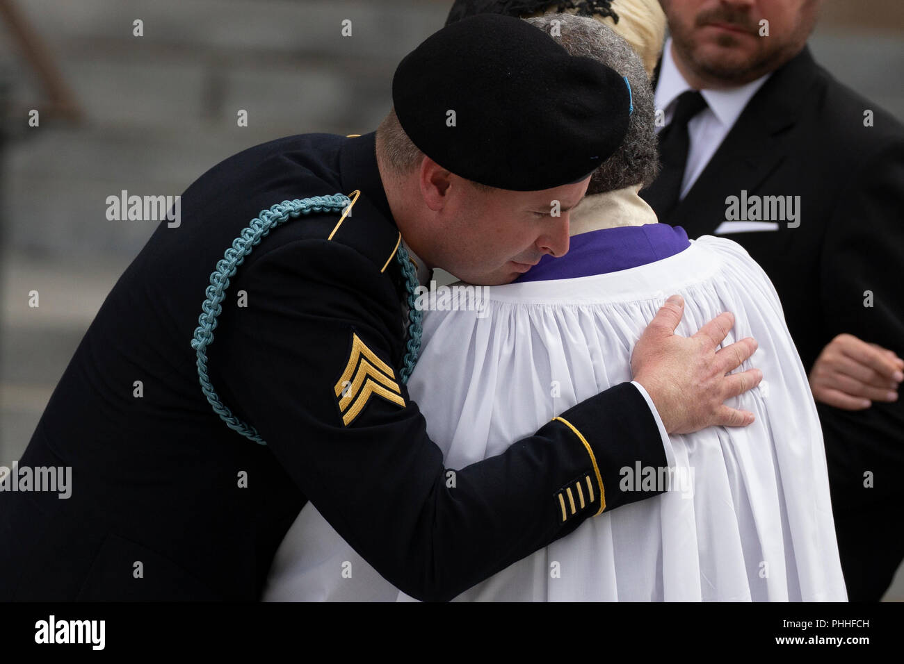 Son of late Arizona Republican Senator John McCain, Jimmy McCain hugs a ...
